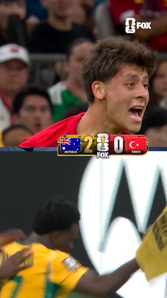 Mohamed Touré celebrating with the Australians in Canada | FOX Sports