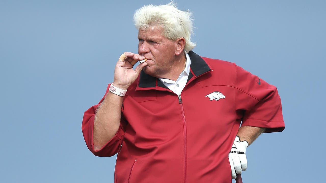 John Daly drinks a lot of Diet Cokes and smokes 40 cigarettes a day ...