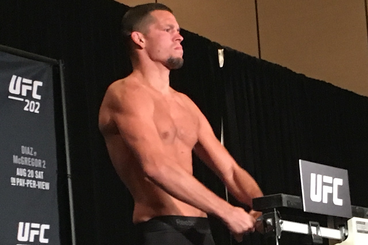 Conor McGregor, Nate Diaz hit the mark at the UFC 202 weigh-ins | FOX ... Conor McGregor, Nate Diaz hit the mark at the UFC 202 weigh-ins | FOX ...