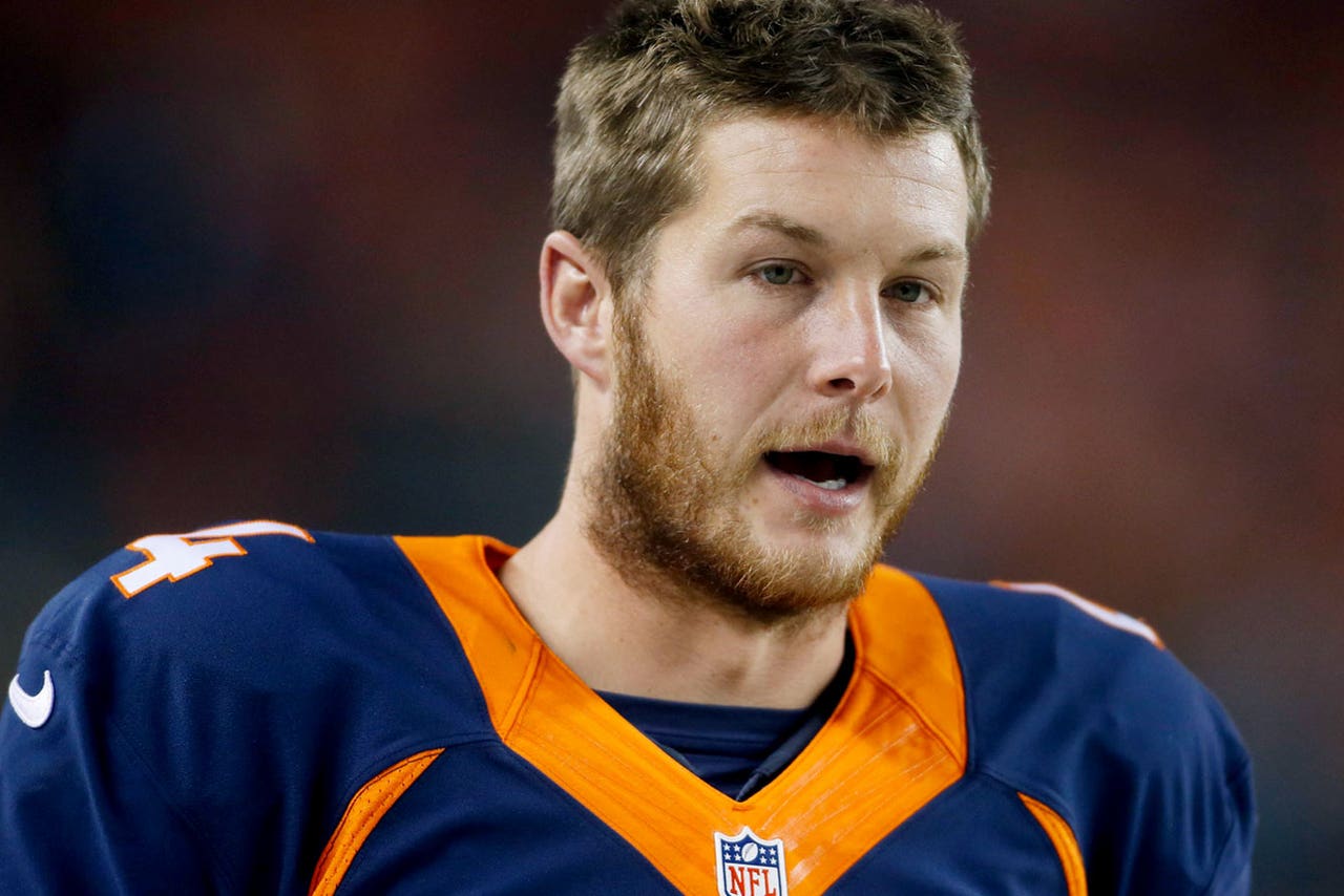 Broncos' Britton Colquitt takes pay cut, locks himself in at punter ...