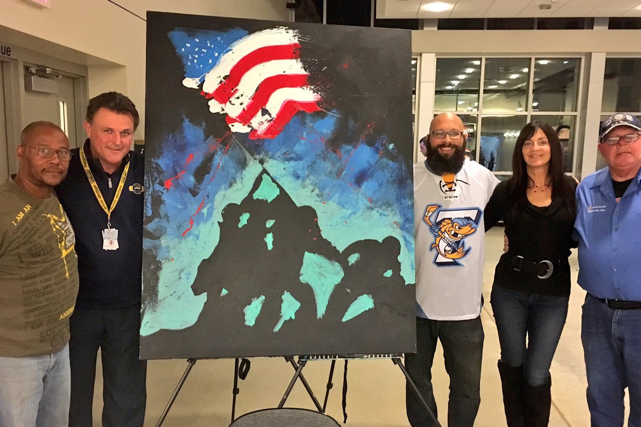 Watch: Singer paints stunning mural during national anthem performance ...