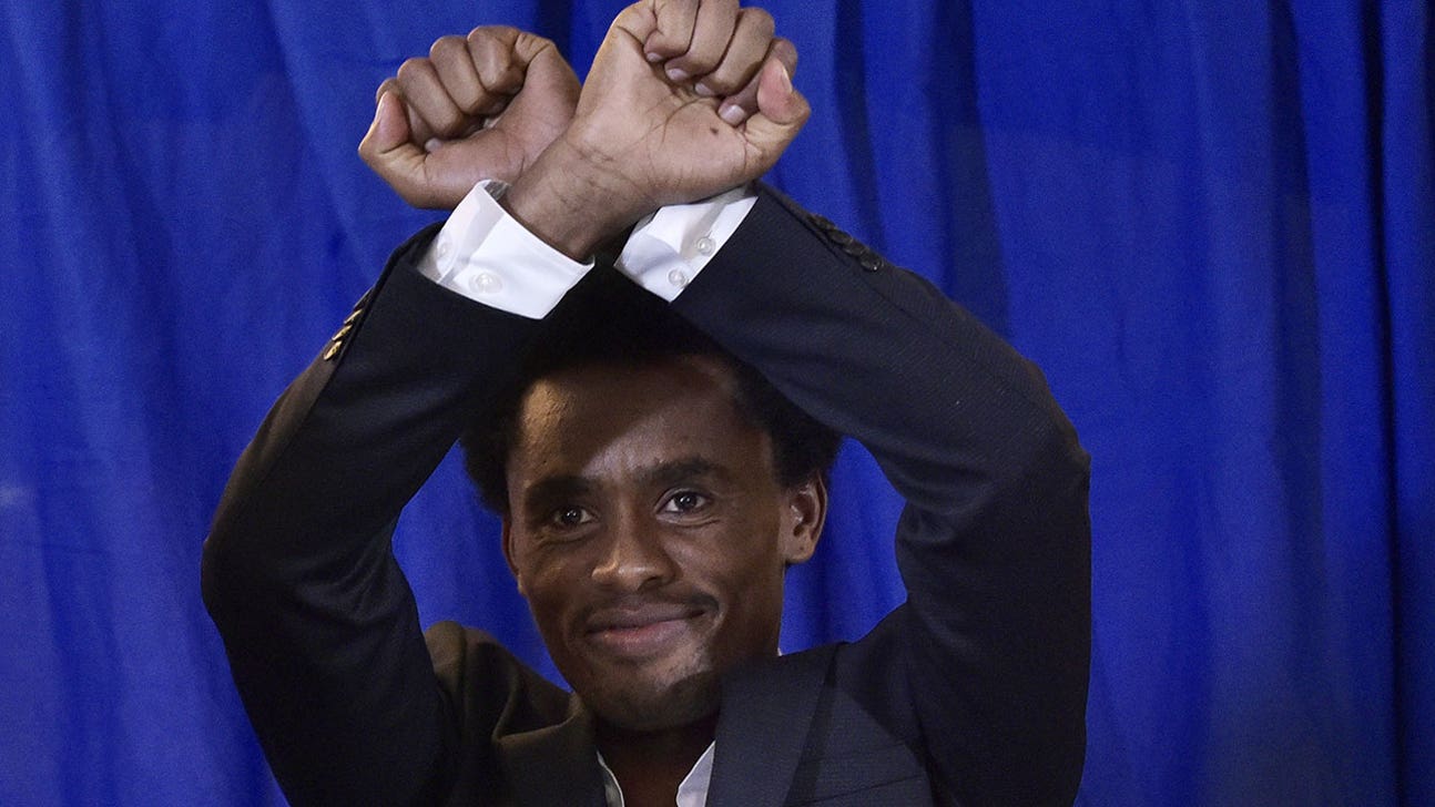 Ethiopian marathoner Feyisa Lilesa arrives in U.S. with hope despite ... Ethiopian marathoner Feyisa Lilesa arrives in U.S. with hope despite ...