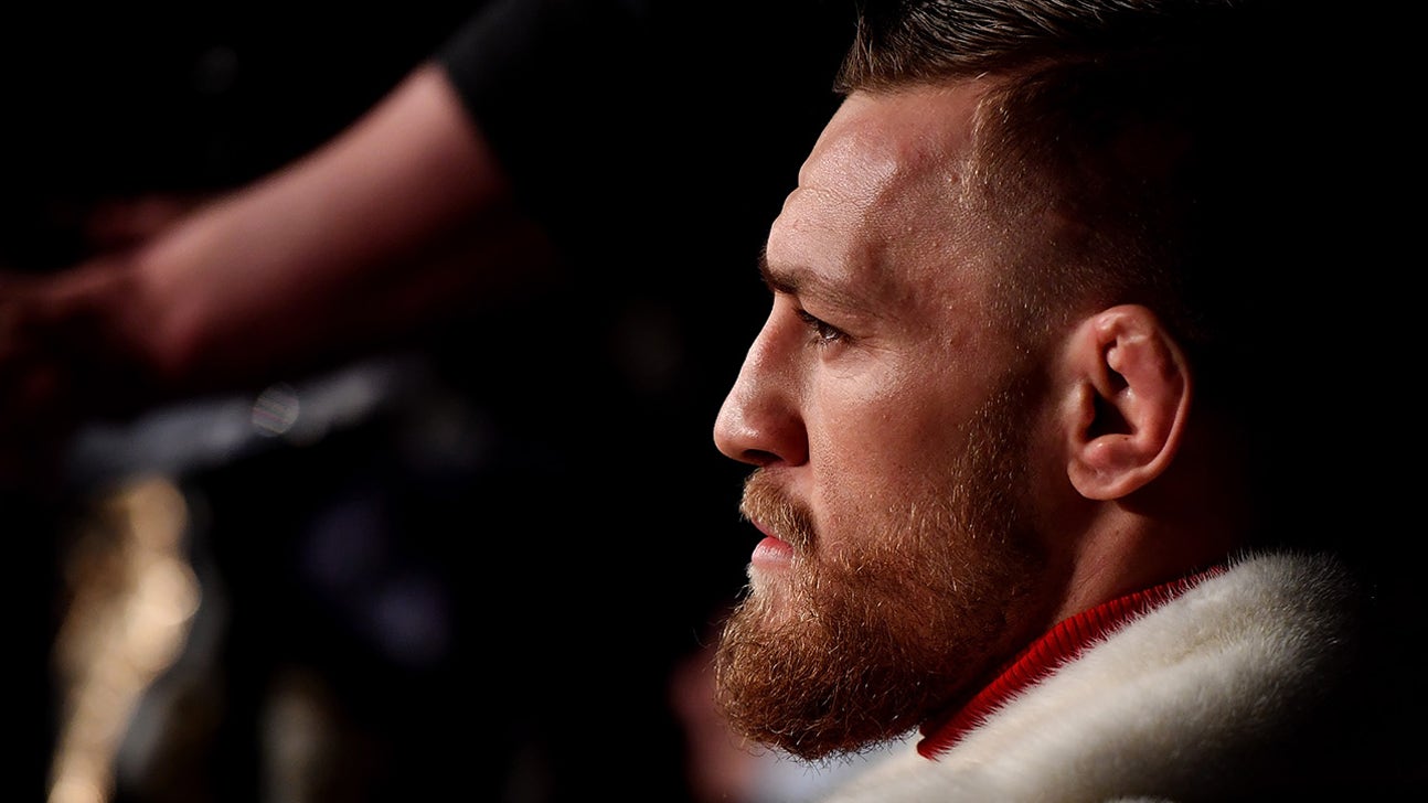 Conor McGregor and Tyron Woodley have intense stare down at UFC 205 ...