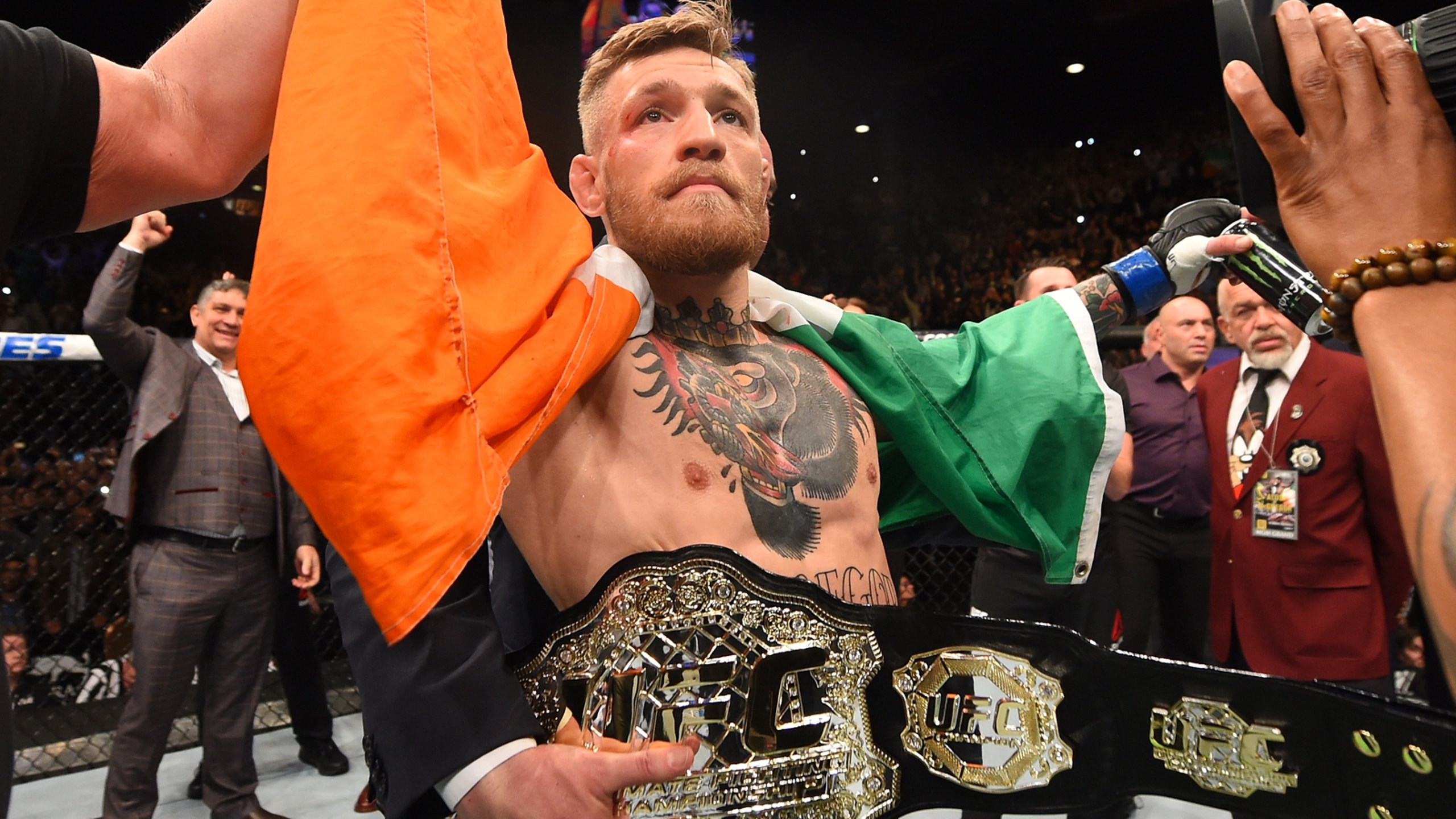 Conor McGregor makes history winning 2nd UFC title after knocking out ...