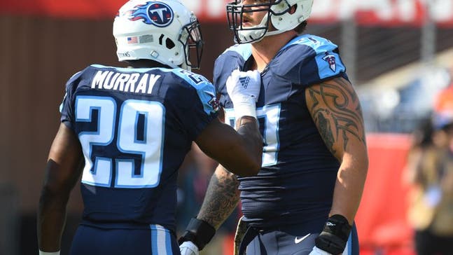 Taylor Lewan Literally Sat Out of Broncos-Titans Fight (Photo) | FOX Sports