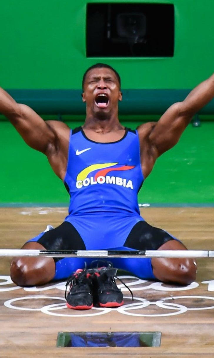 Colombian weightlifter wins gold medal, then retires on the spot | FOX ...