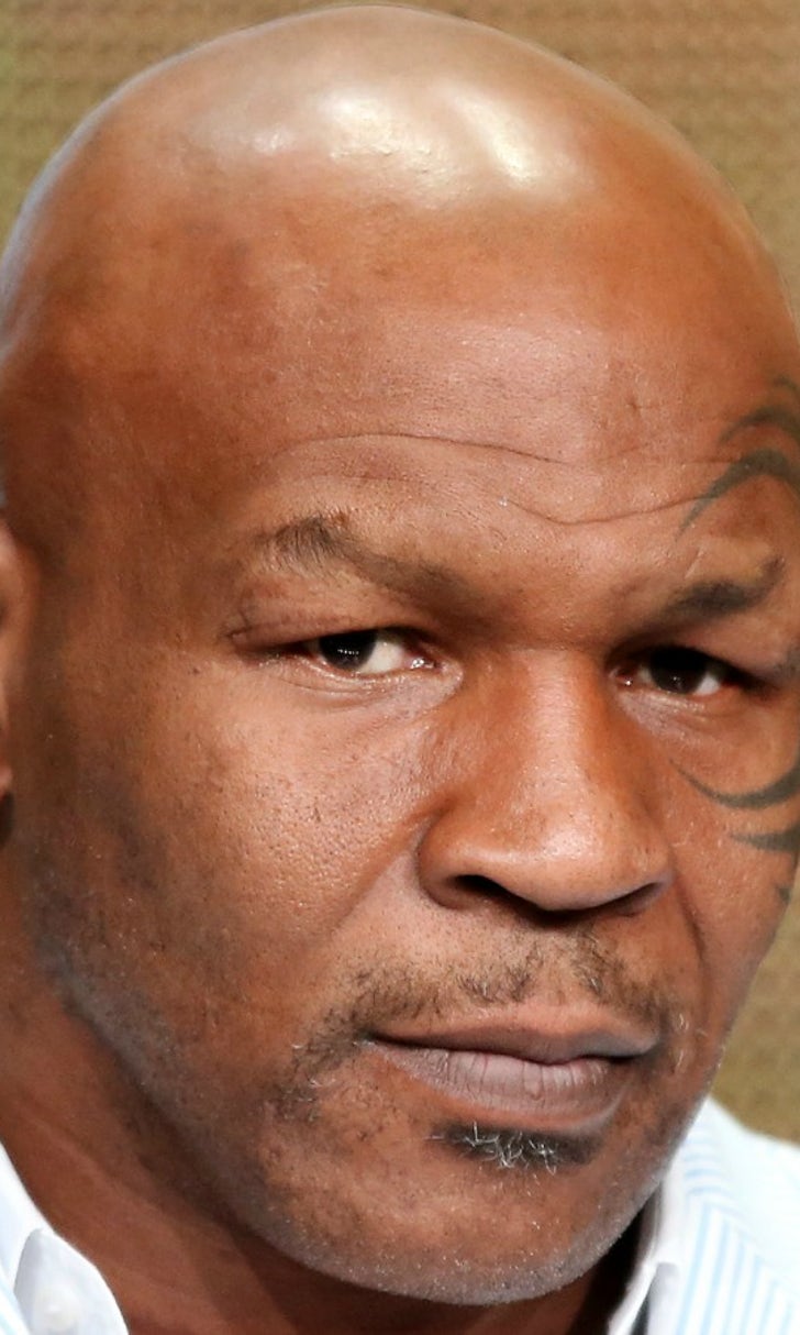 Distraught Mike Tyson took a red-eye flight to be Muhammad Ali's ...