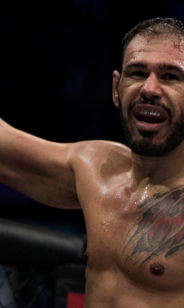 Antonio Rogerio Nogueira carries the Olympic flame in Brazil | FOX Sports