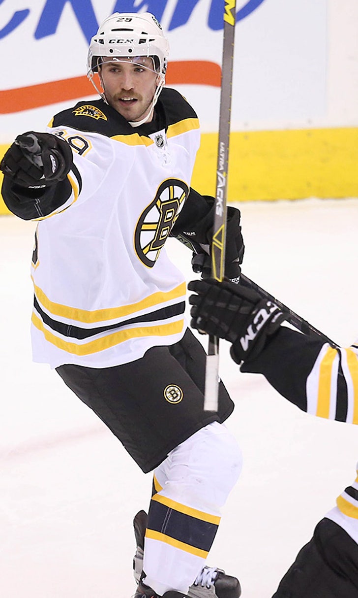 Family affair: Ray Ferraro interviews son Landon during son's Bruins ...