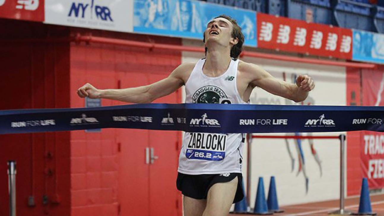 Man runs 211 laps on indoor 200-meter track, breaks indoor marathon ...
