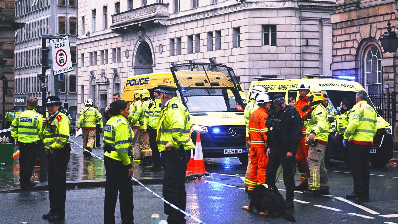 Driver held on 'suspicion of attempted murder' after car plows into ...