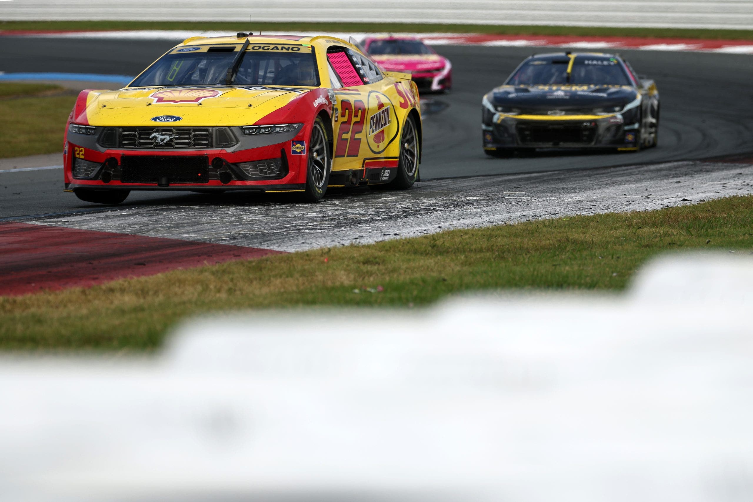 Joey Logano Advances After Denny Hamlin's Move in Wild Last Lap at ...